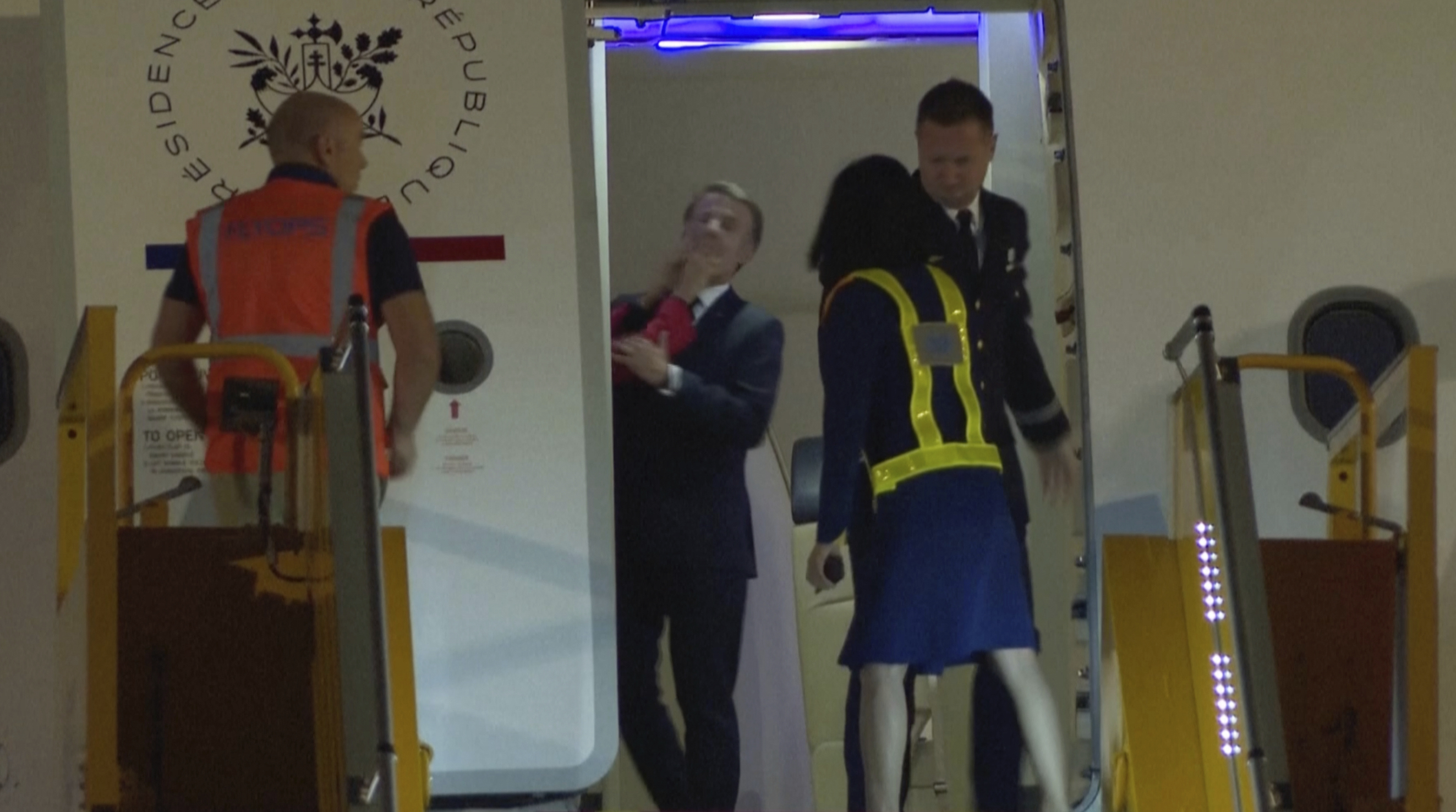 French President Reacts To Viral Video Of Wife Smushing His Face