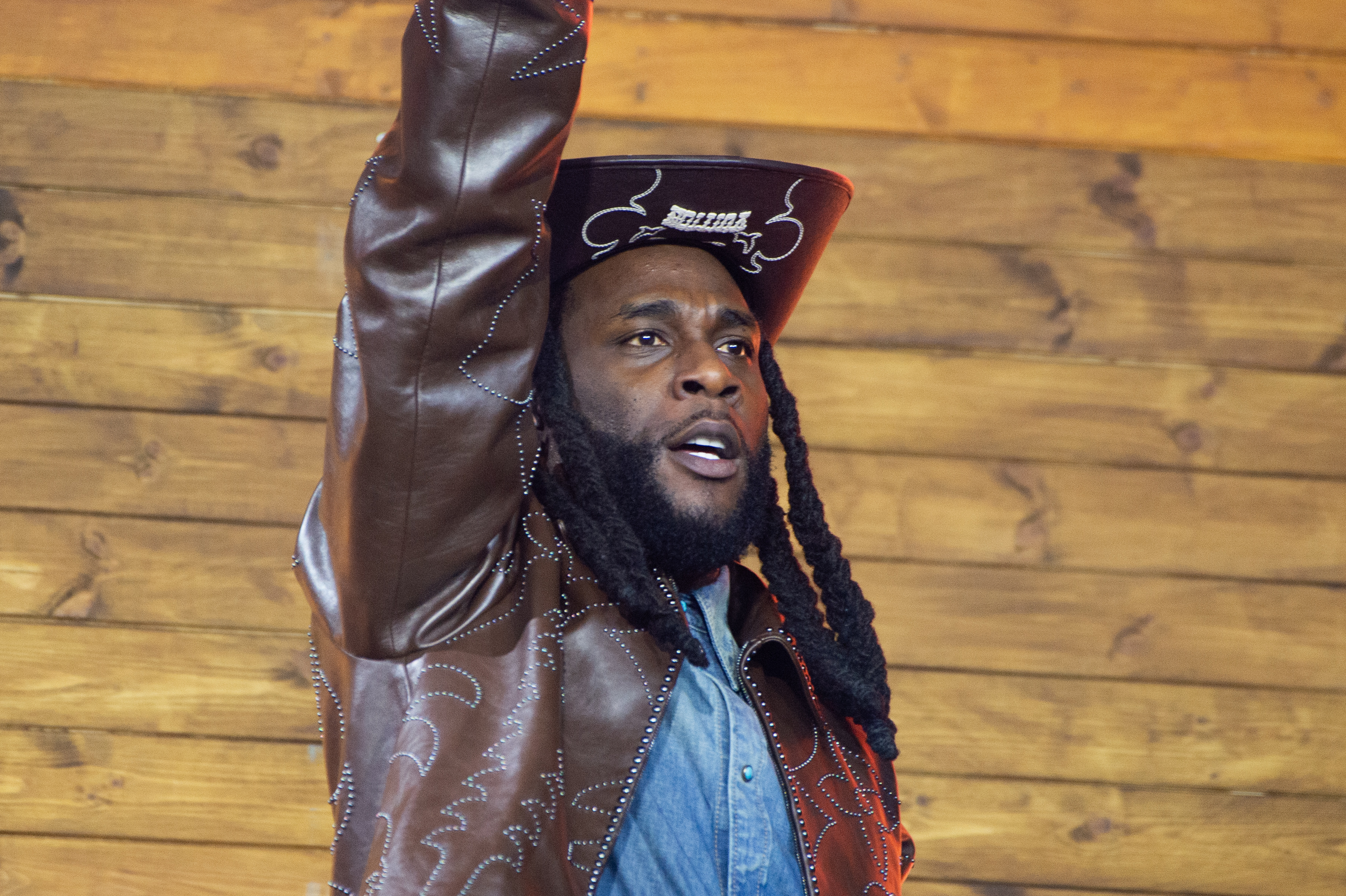 Burna Boy Claps Back After Telling Sleeping Fan To Leave Concert